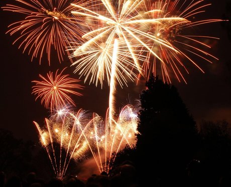 Many attend the firework displays around the UK despite the wet and ...
